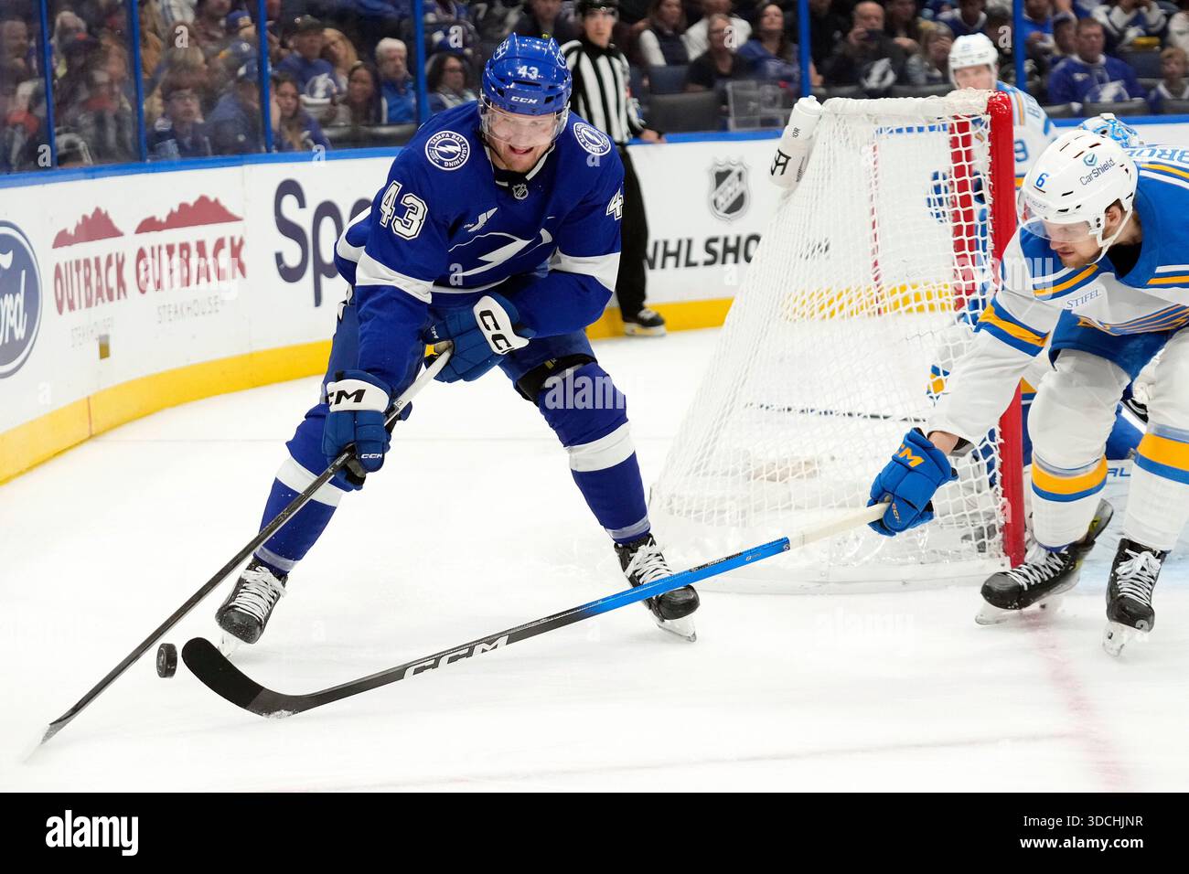 Tampa Bay Lightning defenseman Darren Raddysh (43) plays a bouncing ...
