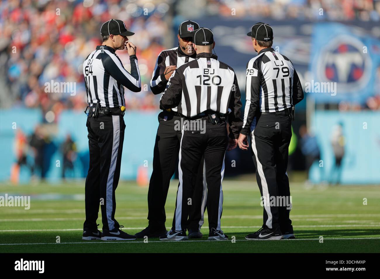 NFL down judge Andy Warner (64) (78) (1200 and (79) talk during the ...