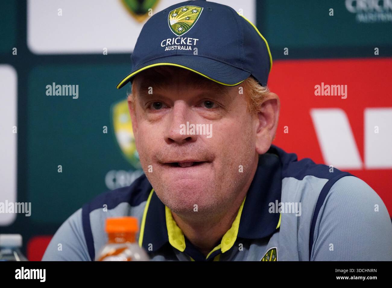 Australia head coach Andrew McDonald takes question during a press ...