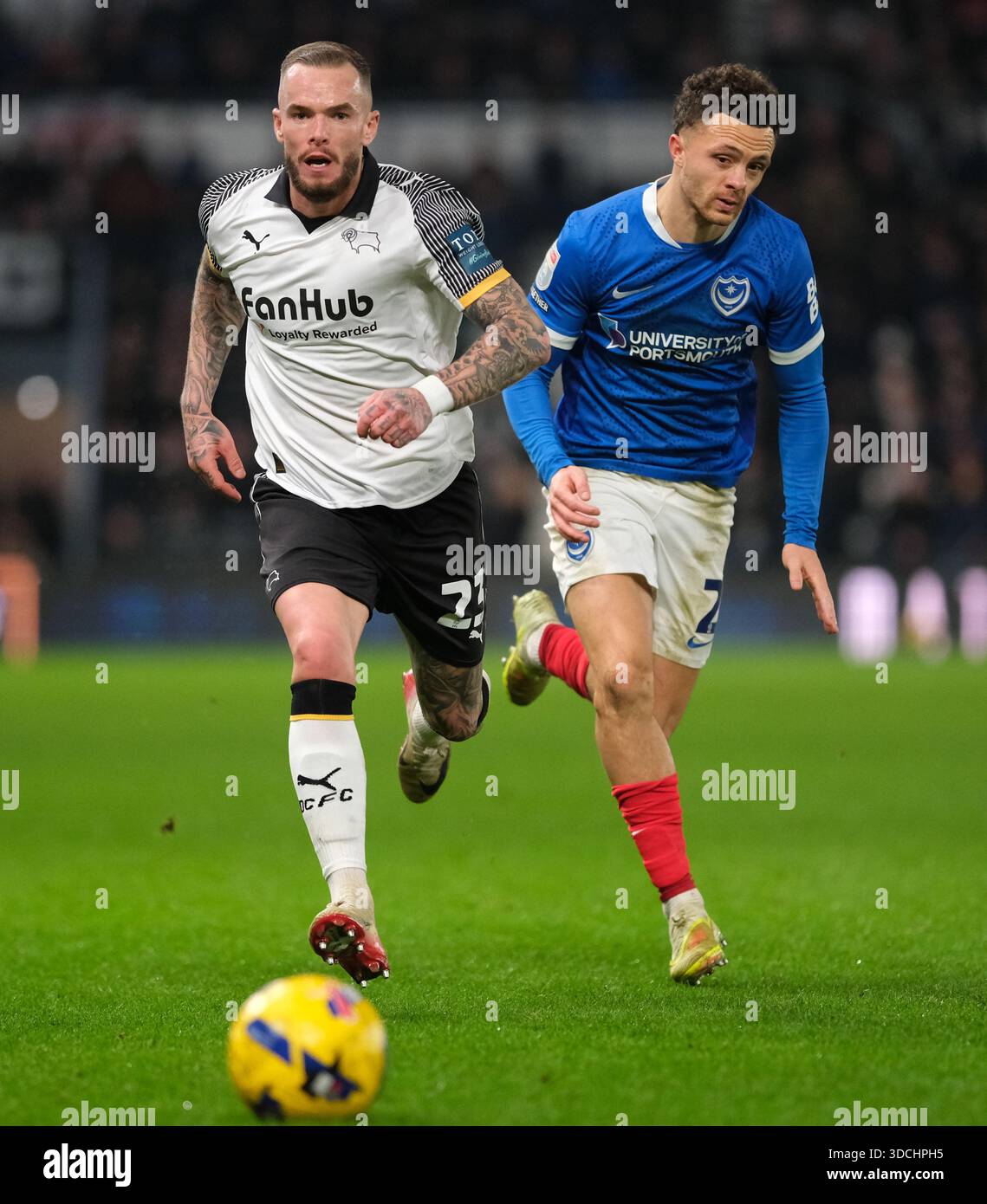 Joe Ward of Derby County and Jordan Williams of Portsmouth seen in ...