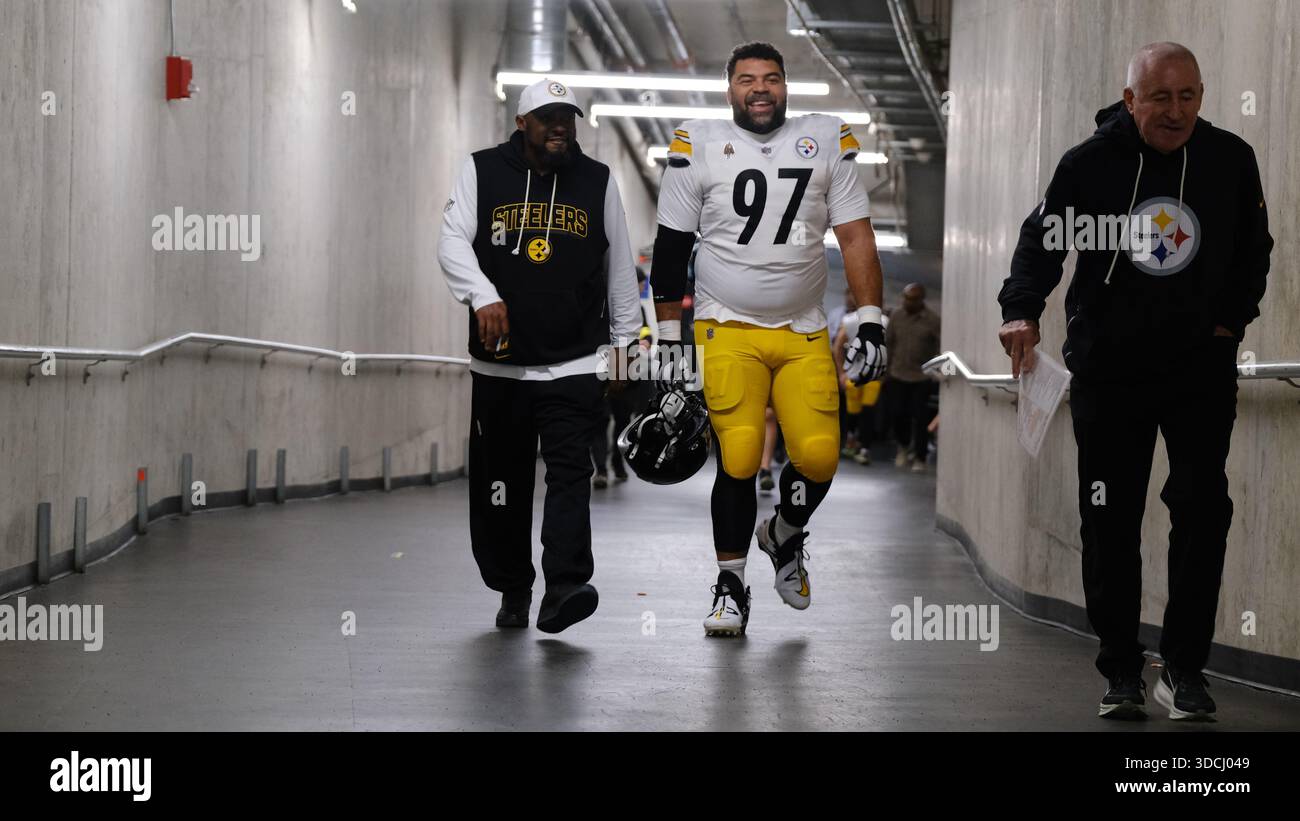 Dec 21, 2025: Head Coach Mike Tomlin, and Cam Heyward #97 during the ...