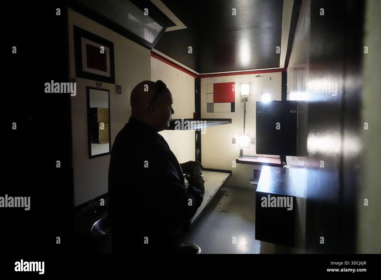 Lt. Joseph Guerrero gives a tour of an inmate's room at California ...