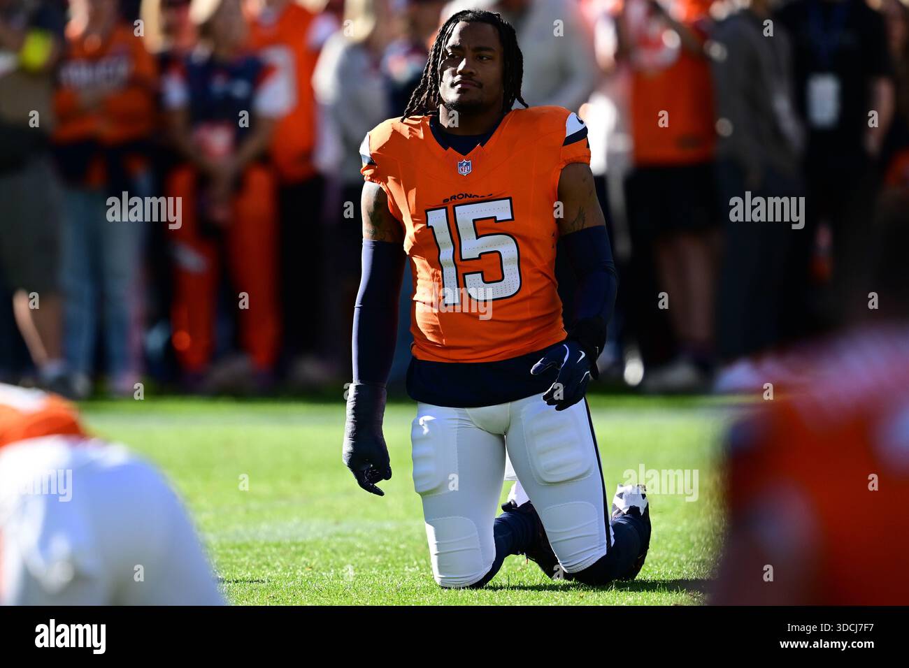 Denver Broncos linebacker Nik Bonitto warms up before an NFL football ...