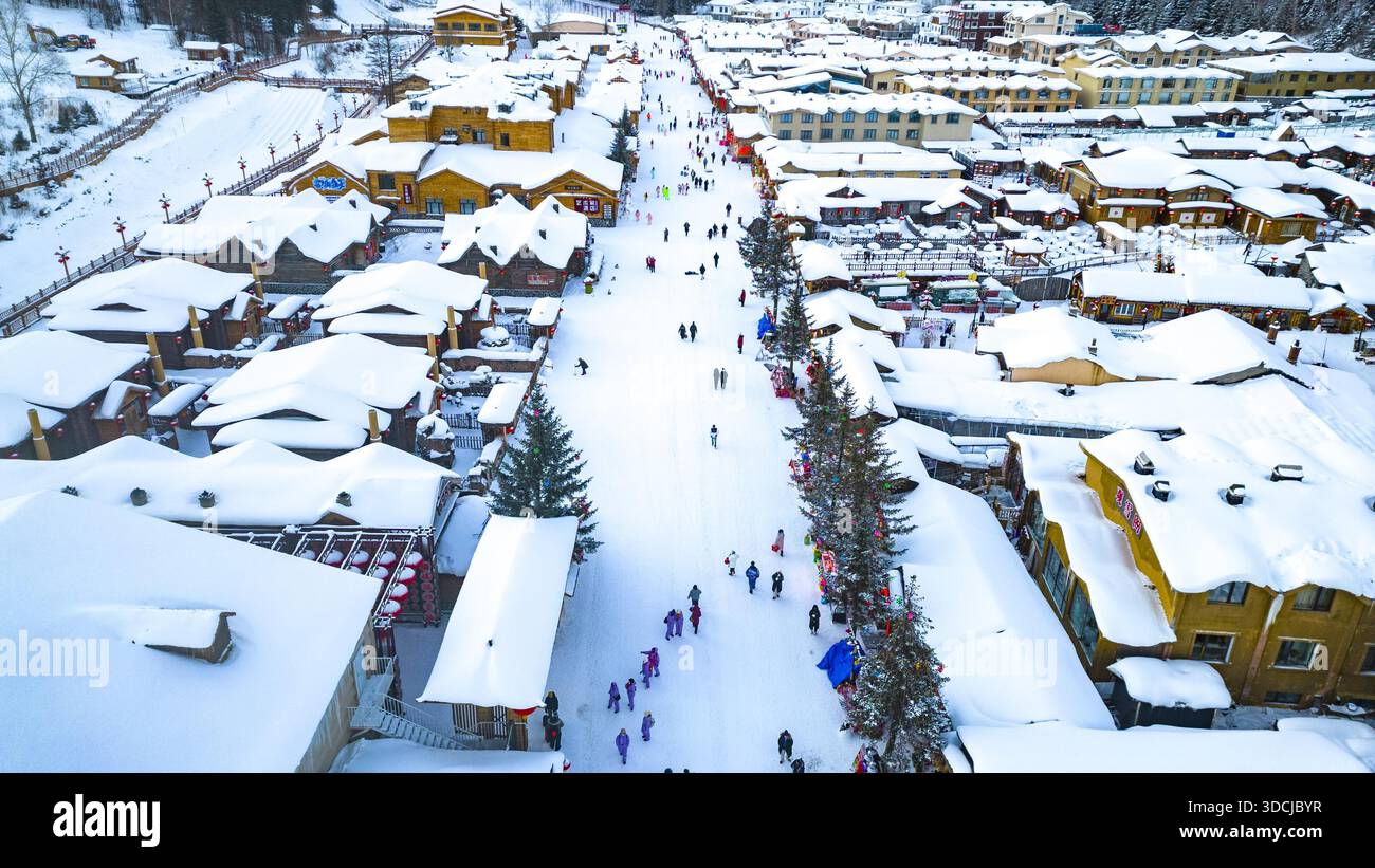 Aerial photo shows tourists visiting the China Snow Town scenic area in ...