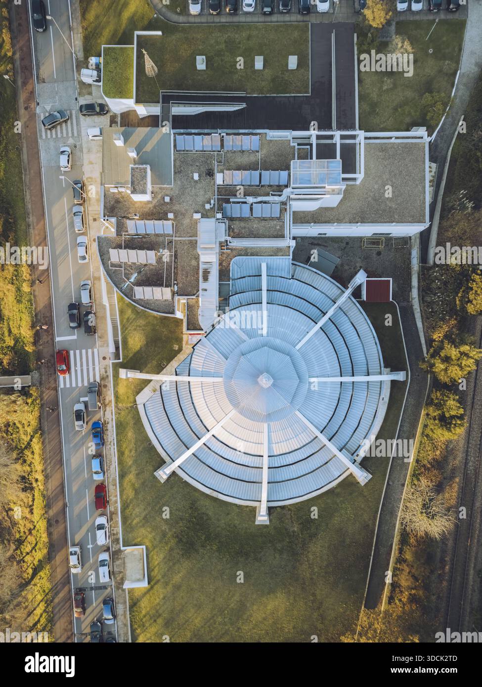 Aerial view of a modern building with a circular design and radiating ...