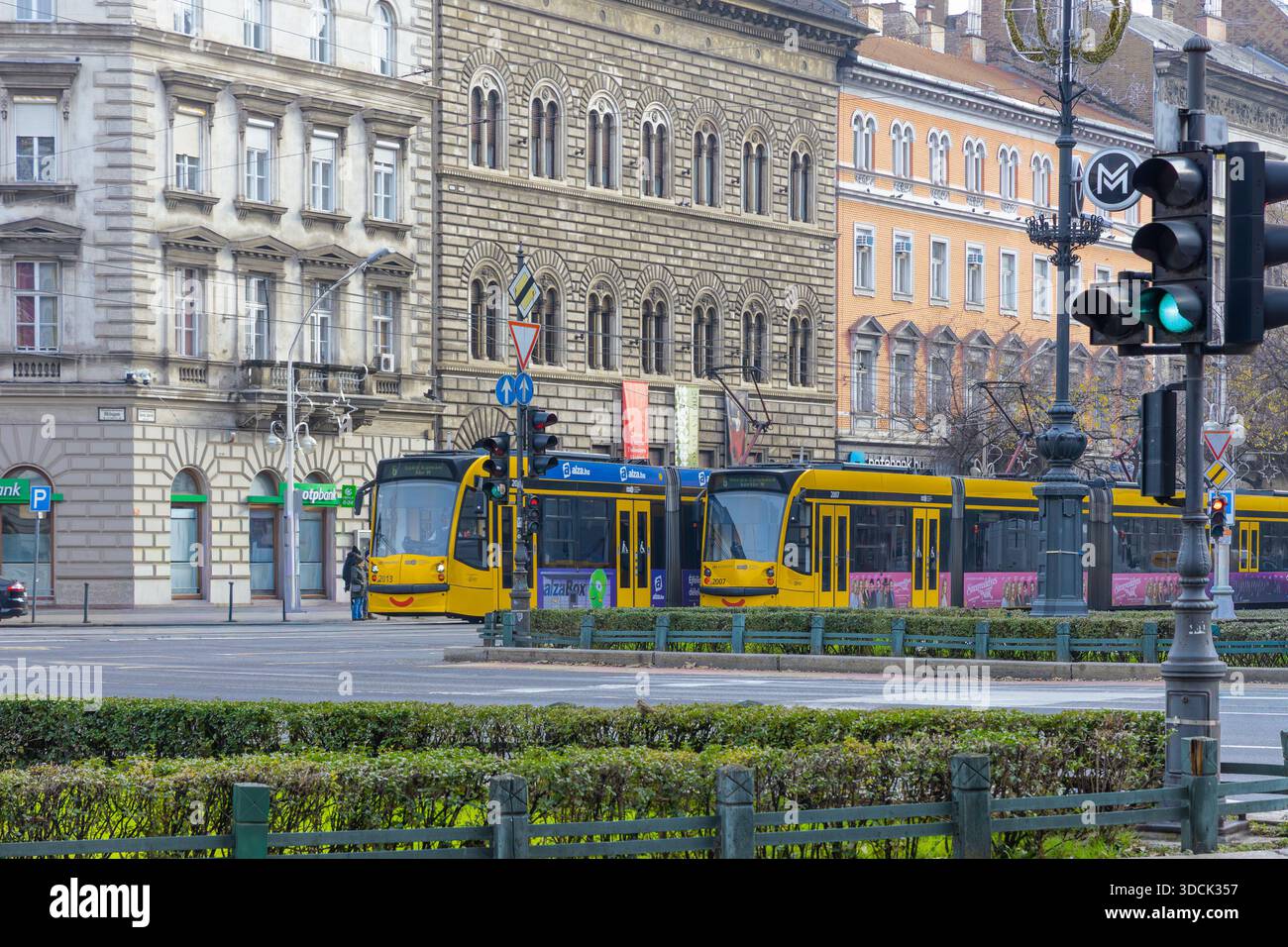 Budapest, Hungary - October 24 2025: Yellow trams at Oktogon ...