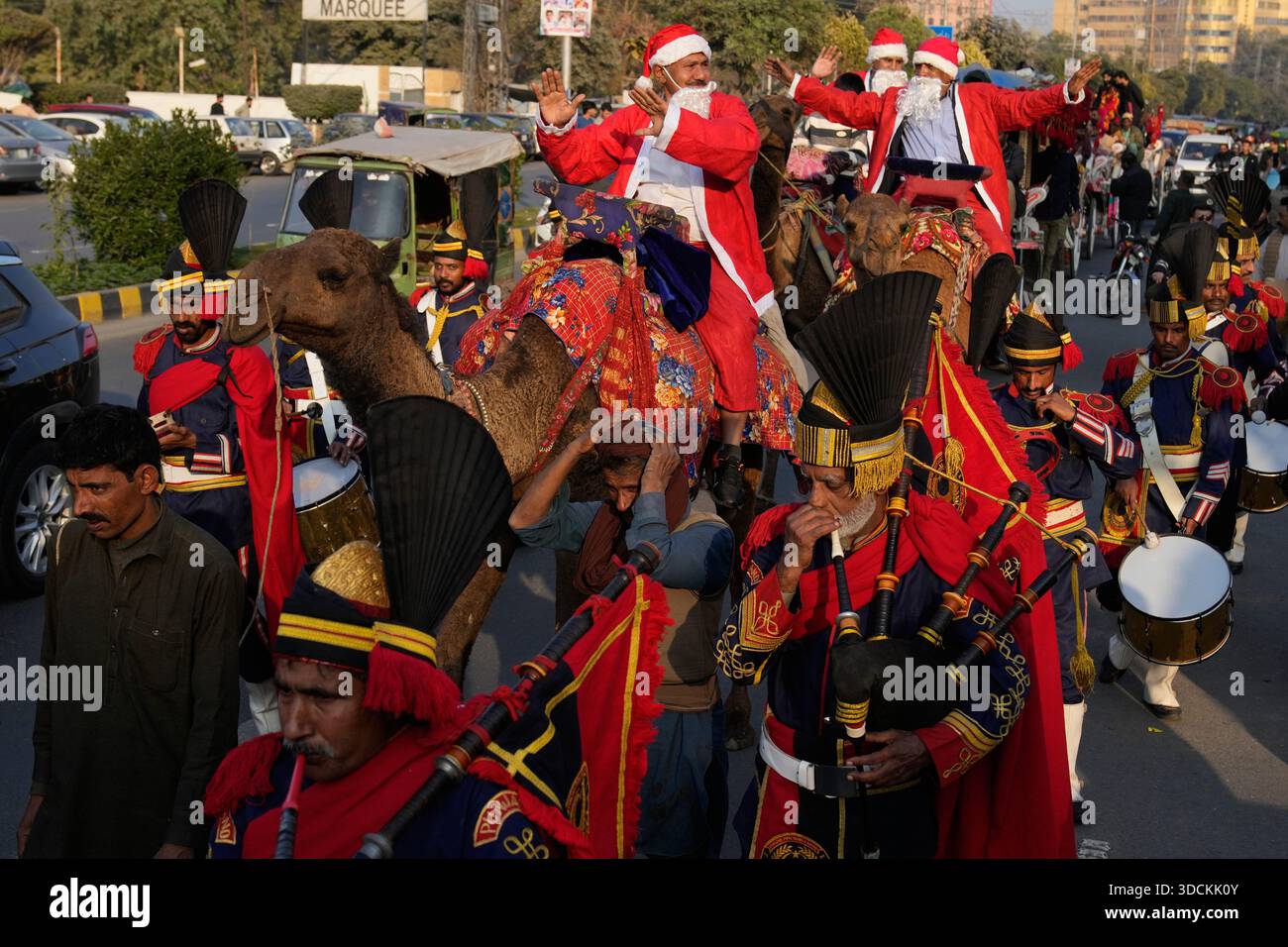 Christians wearing Santa Claus costumes, participate in a Christmas ...