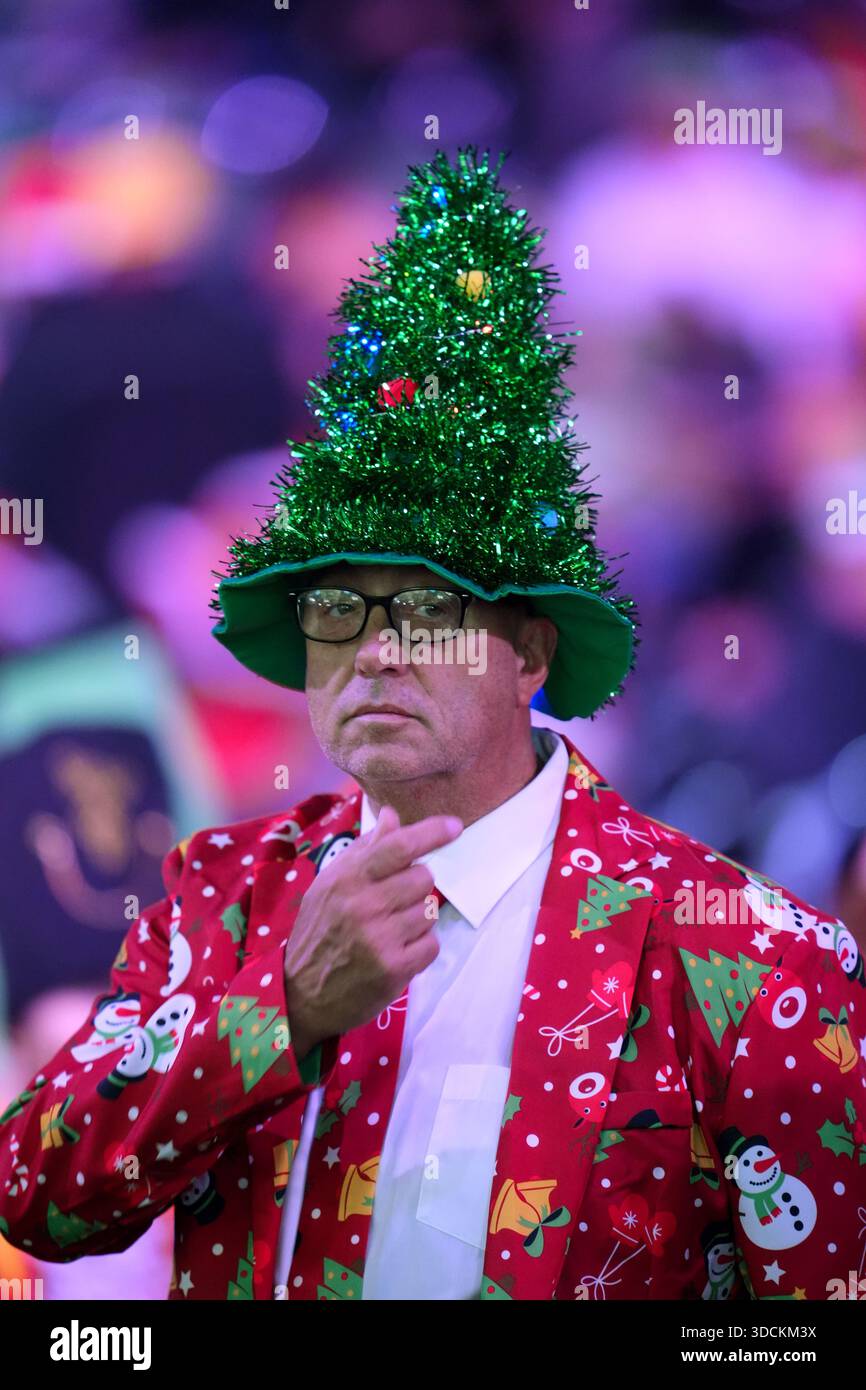 A fan wearing a Christmas Tree hat in the crowd on day thirteen of the ...