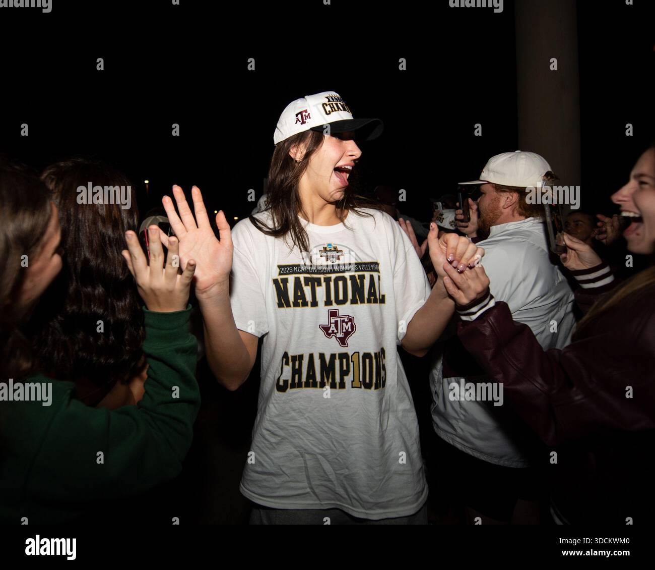 Logan Lednicky and the national champion Texas A&M volleyball team ...