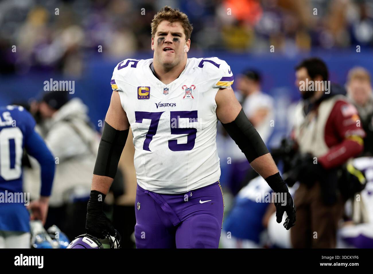 Minnesota Vikings offensive tackle Brian O'Neill (75) walks off the ...