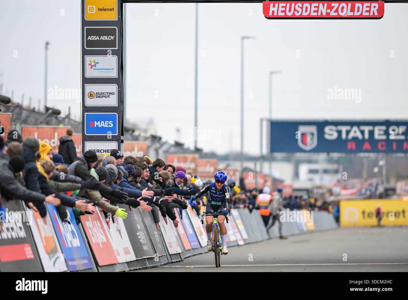 Belgian Fleur Moors crosses the finish line at the women elite race at ...