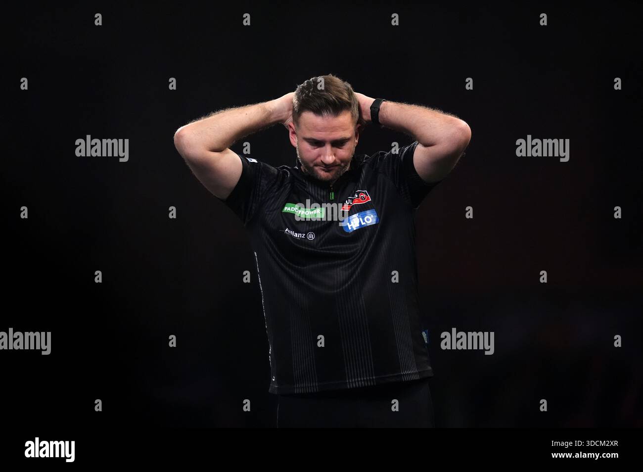 Germany's Arno Merk celebrates defeating Scotland's Peter Wright on day ...
