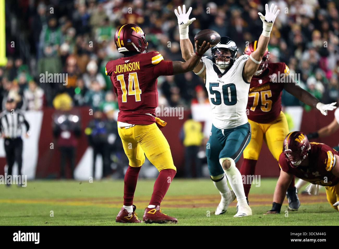 Washington Commanders quarterback Josh Johnson (14) throws the ball ...