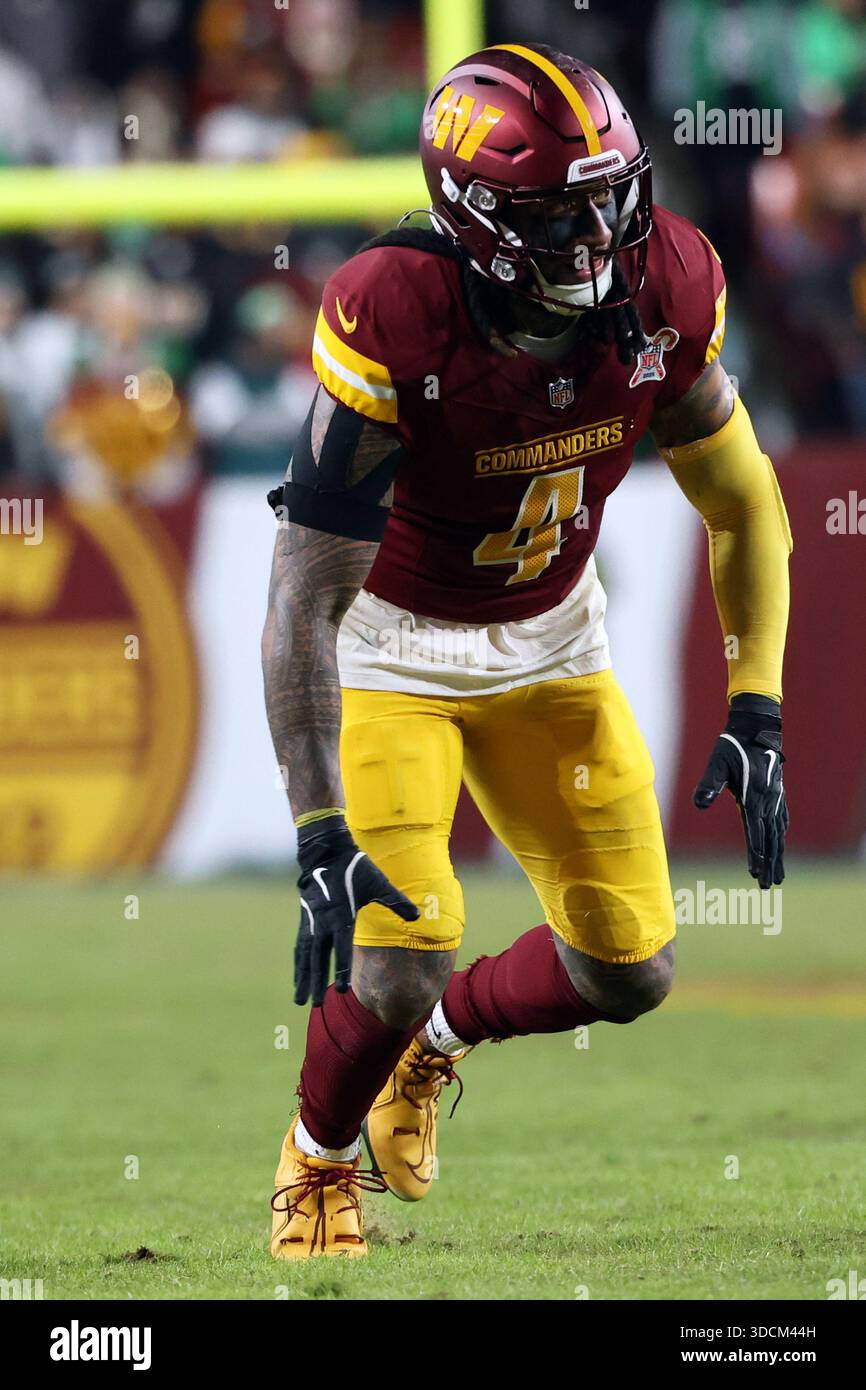 Washington Commanders linebacker Frankie Luvu (4) rushes during an NFL ...
