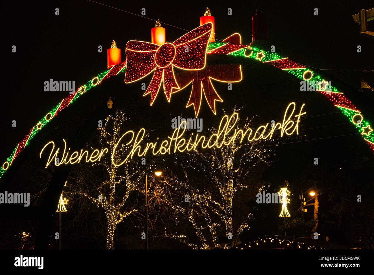 Wiener Christkindlmarkt neon sign with festive red bow. Beautiful ...
