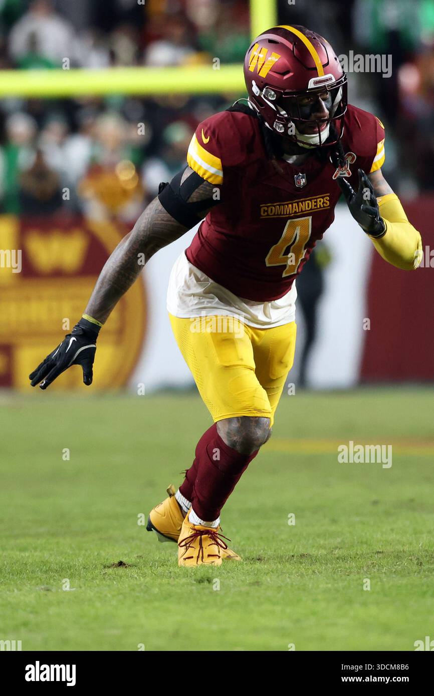 Washington Commanders linebacker Frankie Luvu (4) rushes during an NFL ...