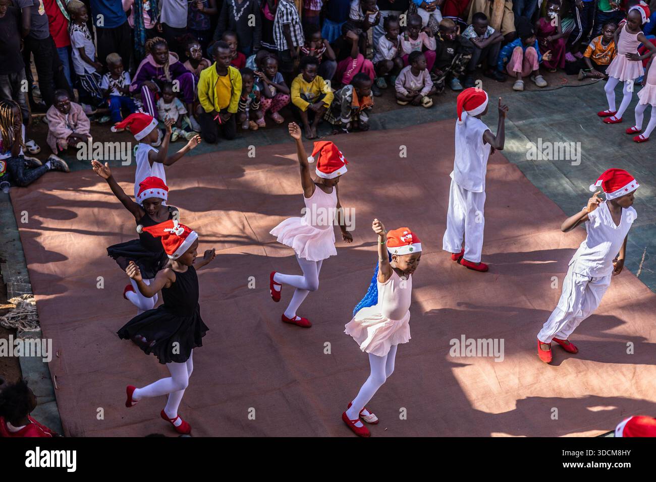 Young dancers perform during a Christmas ballet event in Nairobi ...