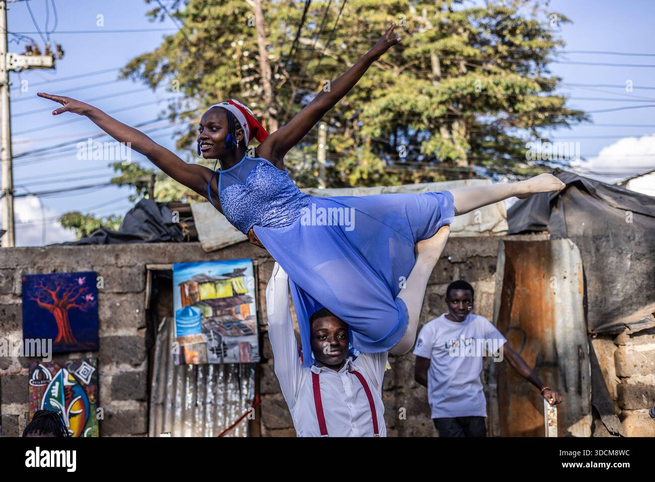 Young dancers perform during a Christmas ballet event in Nairobi ...