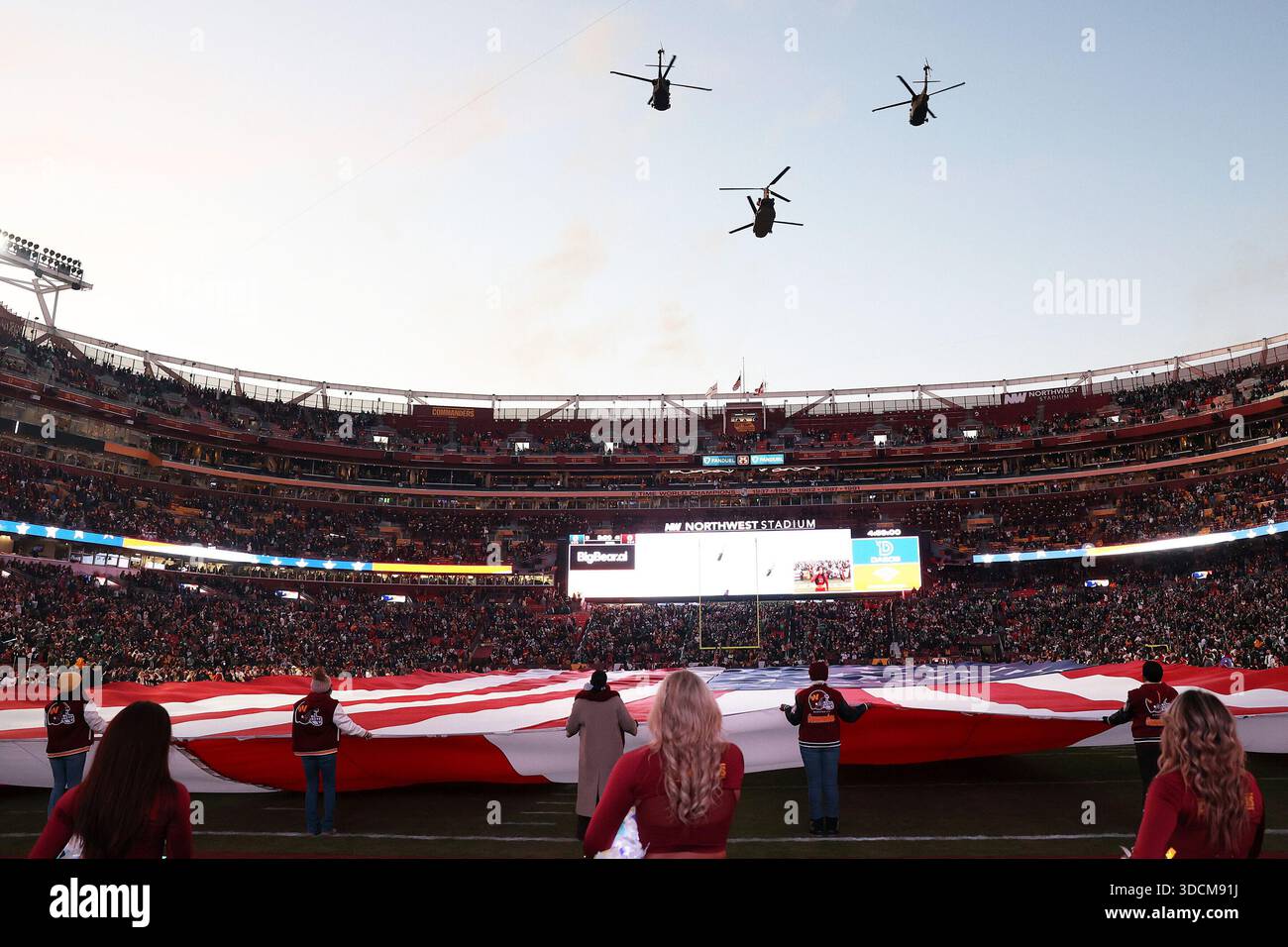 A flyover commences before an NFL football game between the Washington ...