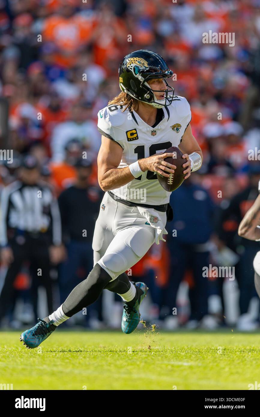 Jacksonville Jaguars quarterback Trevor Lawrence (16) rolls out against ...