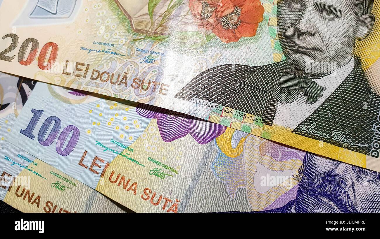 Close-up of Romanian money. The notes showcase cultural and national ...