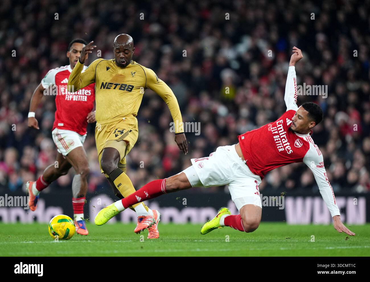 Arsenal's William Saliba (right) challenges Crystal Palace's Jean ...