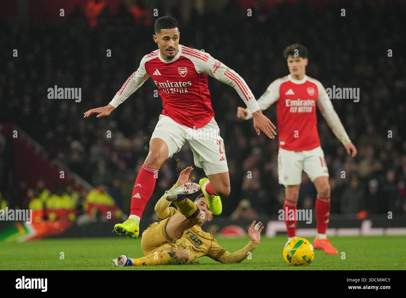 Arsenal's William Saliba escapes tackle by Crystal Palace's Adam ...