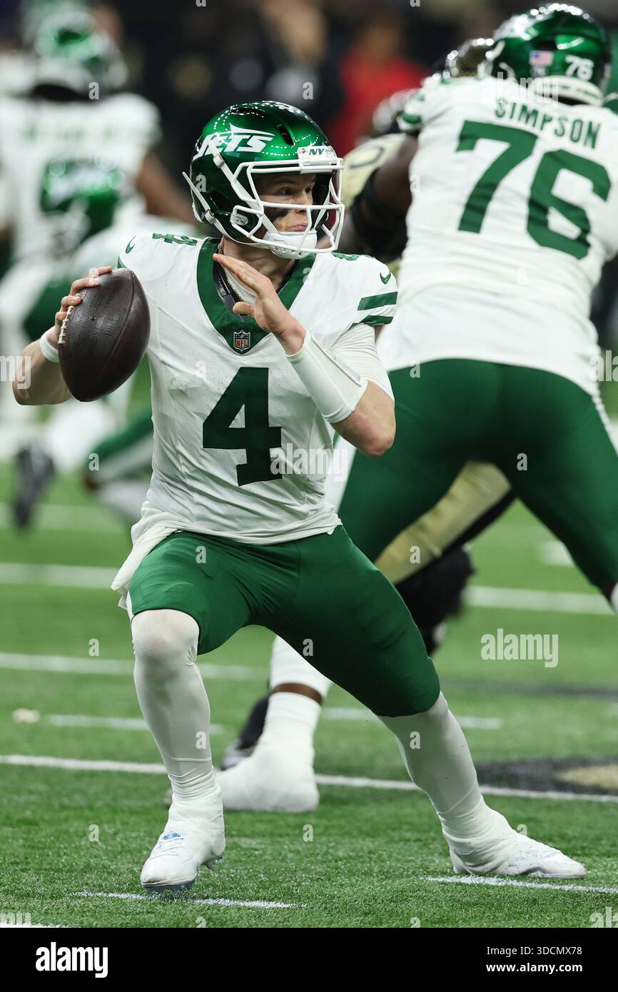New York Jets quarterback Brady Cook (4) looks to throw a pass against ...