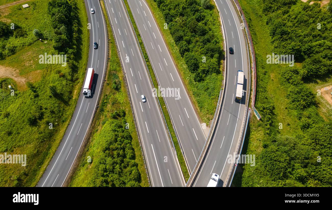 Aerial drone view of a complex highway cloverleaf interchange ...