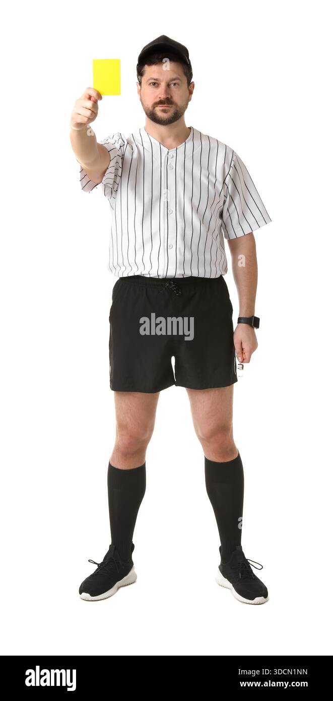 Referee holding yellow card and whistle on white background Stock Photo ...