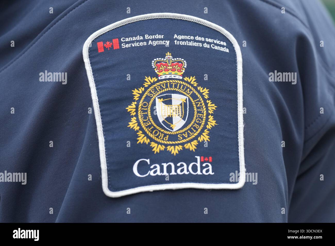 A Canada Border Services Agency patch is seen on the shoulder of a CBSA ...