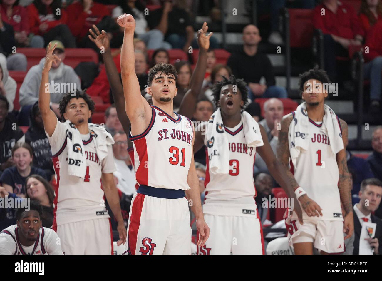 St. John's Lefteris Liotopoulos (31) follows through on a three-point ...