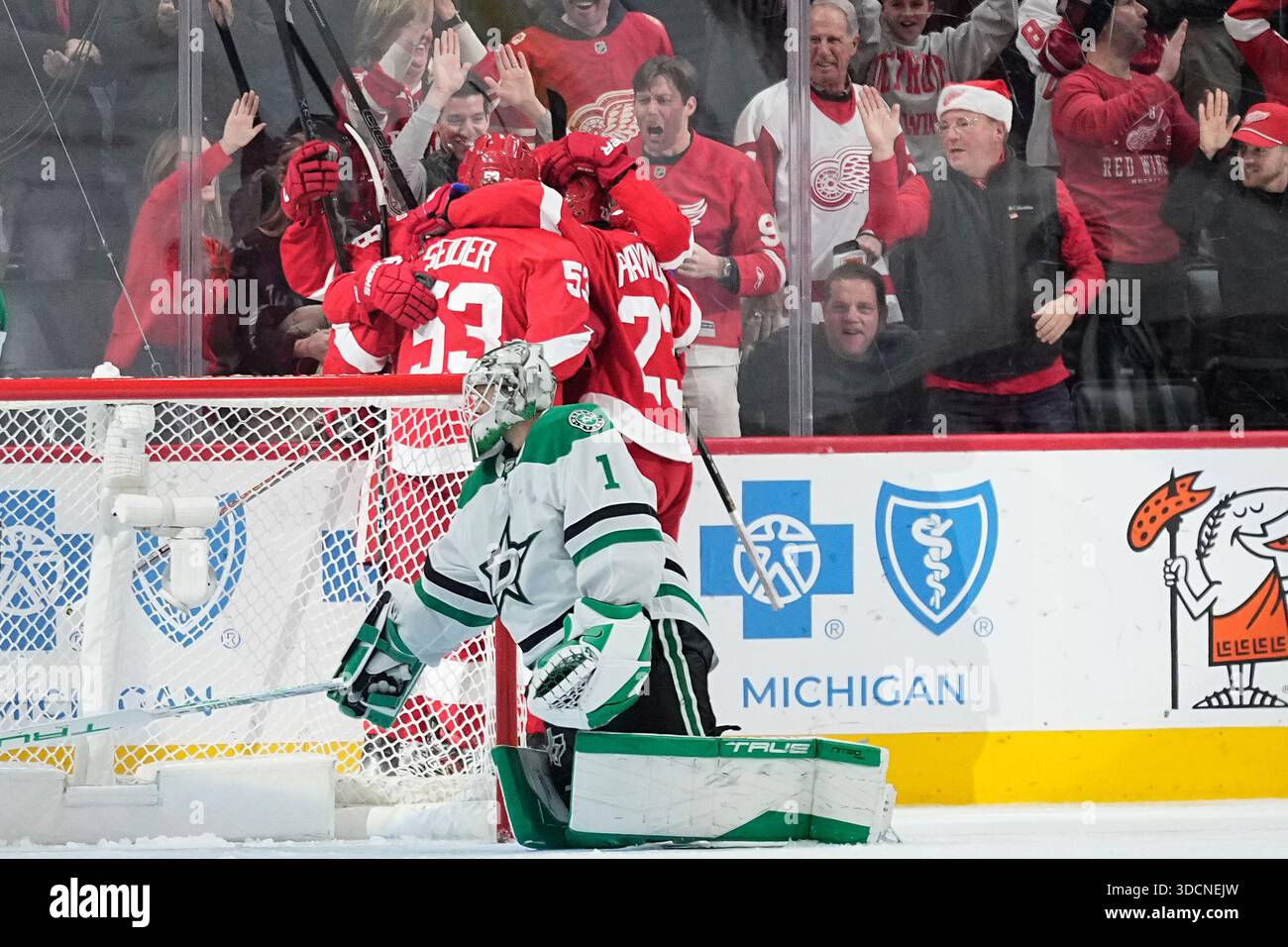 Detroit Red Wings center Emmitt Finnie, not pictured, celebrates with ...