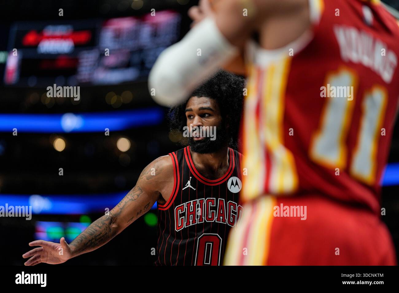 Chicago Bulls guard Coby White (0) works against Atlanta Hawks guard ...