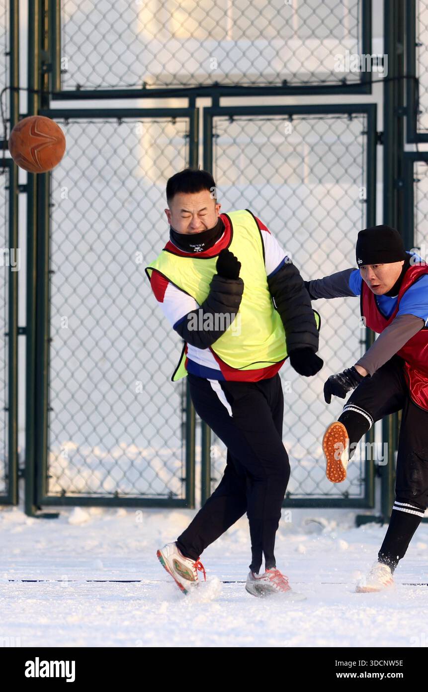 A snow football match is held at the Harbin Ice-Snow World in Harbin ...