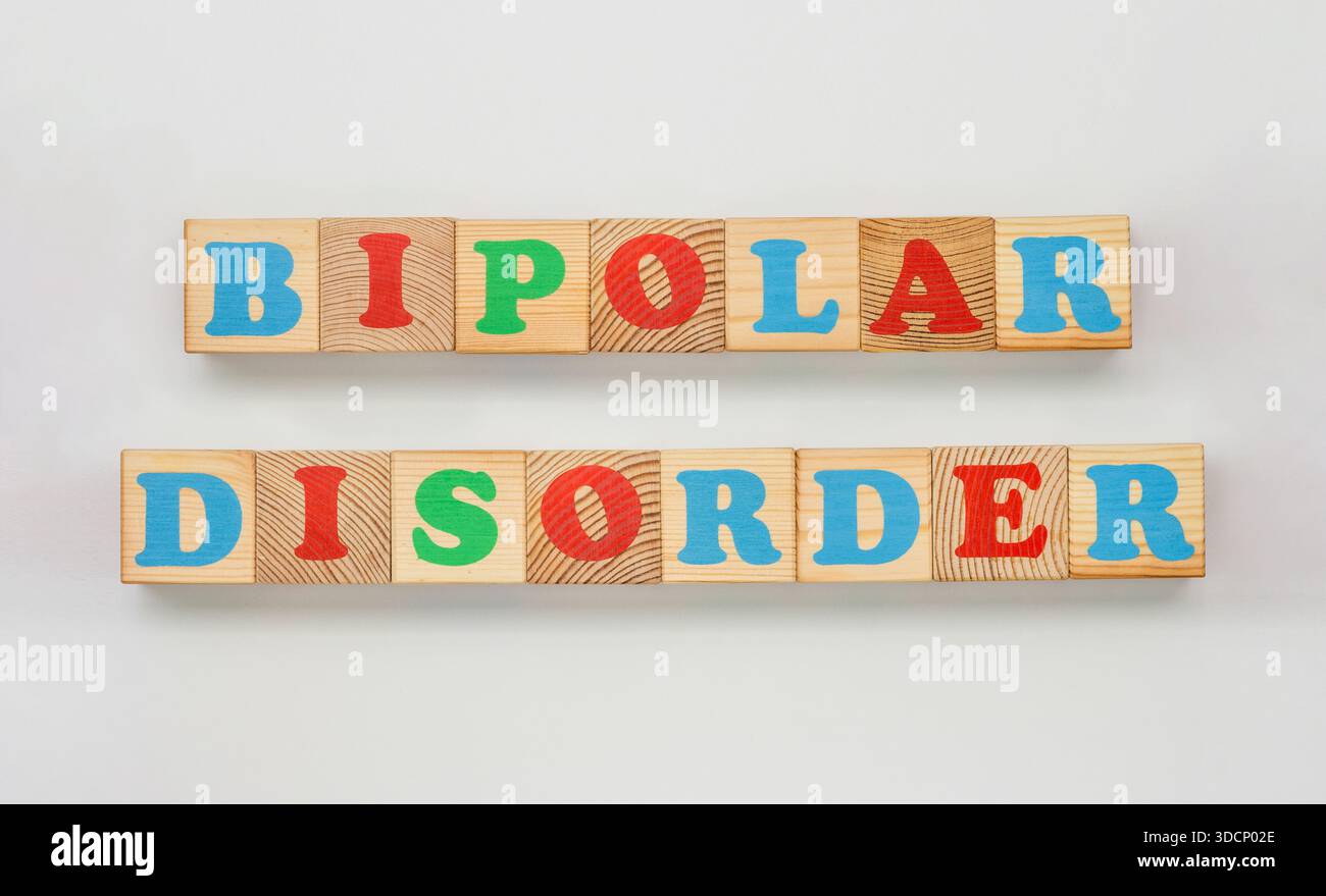 Word Bipolar Disorder shown using colorful wooden cubes Stock Photo - Alamy