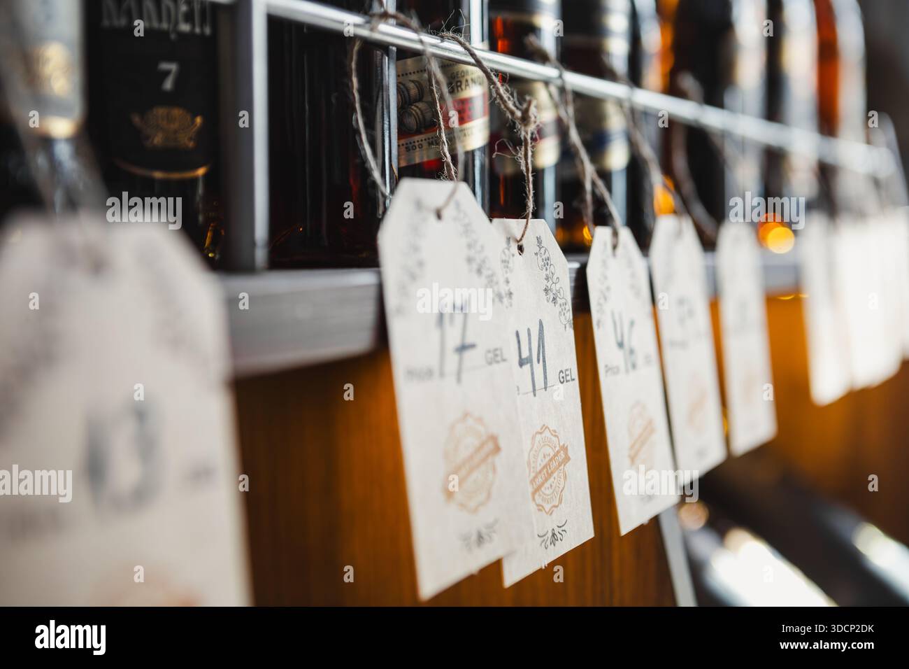 Tbilisi, Georgia - 3 29 2025: A row of price tags with handwritten ...