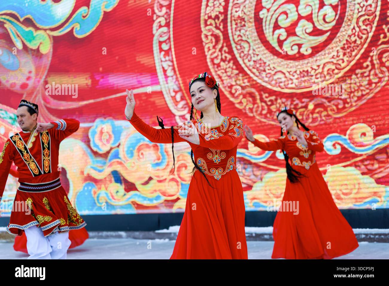 Tourists enjoy skiing fun at the 23rd Urumqi Silk Road Ice & Snow ...