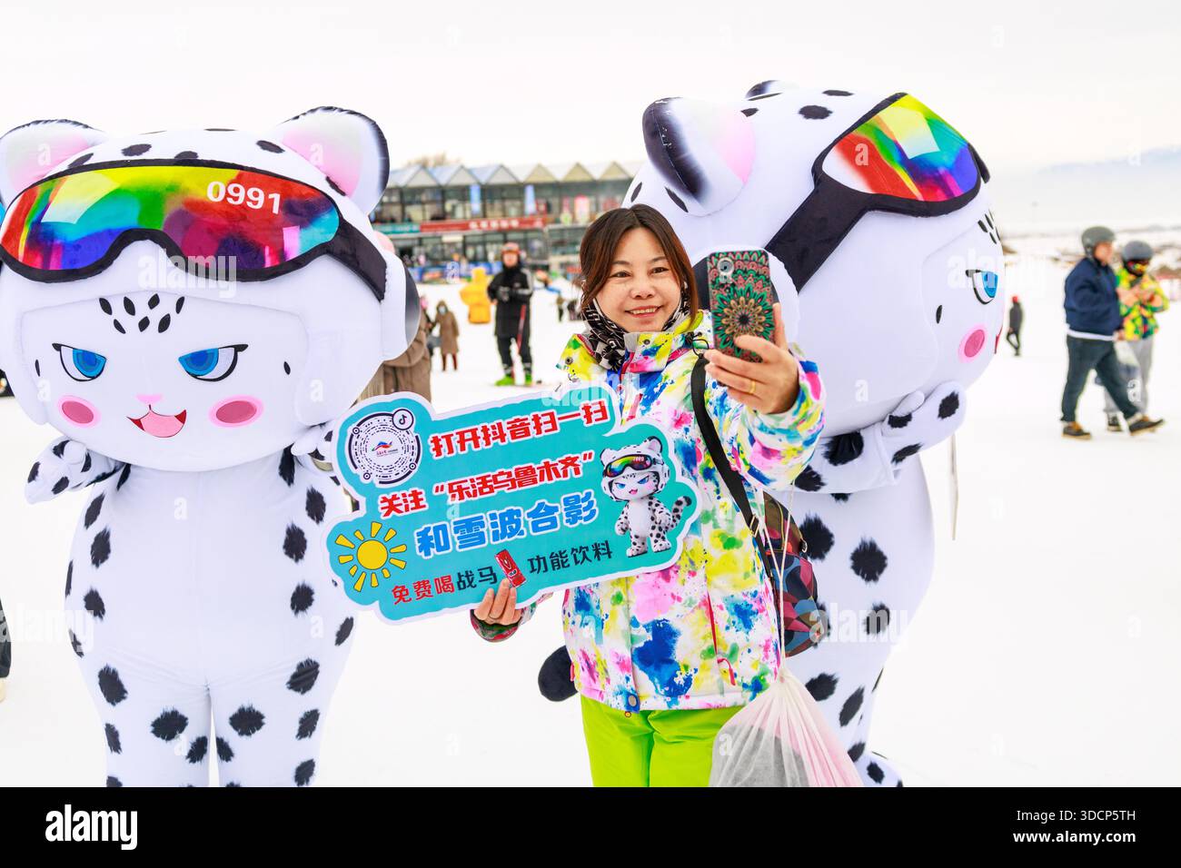 Tourists enjoy skiing fun at the 23rd Urumqi Silk Road Ice & Snow ...