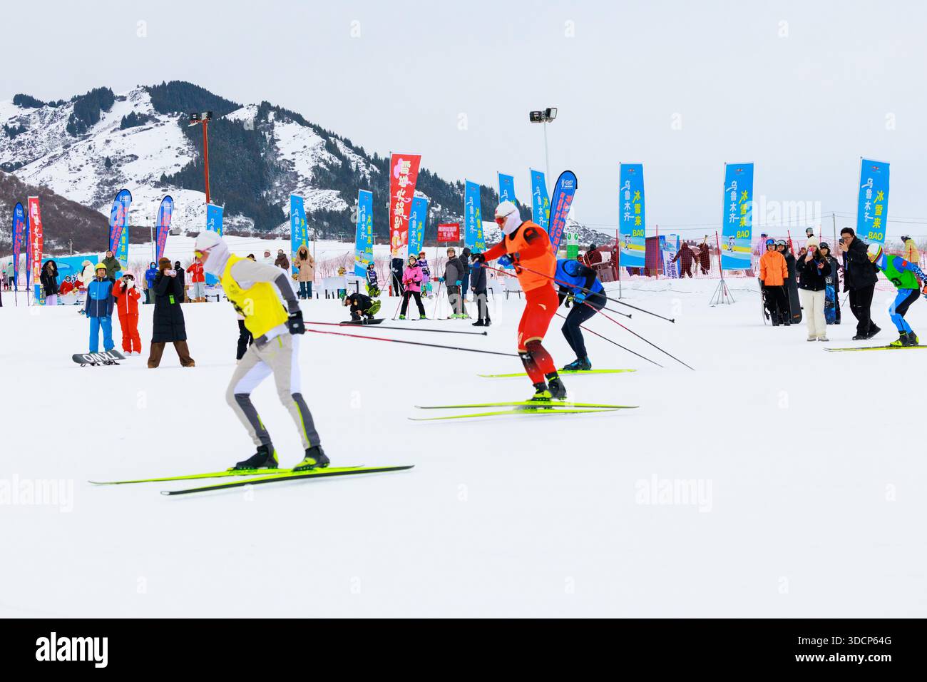 Tourists enjoy skiing fun at the 23rd Urumqi Silk Road Ice & Snow ...