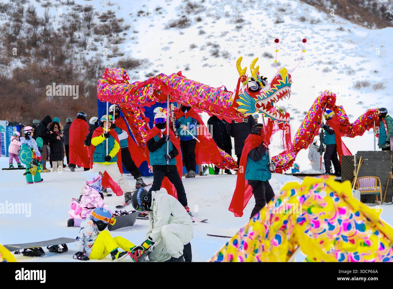 Tourists enjoy skiing fun at the 23rd Urumqi Silk Road Ice & Snow ...