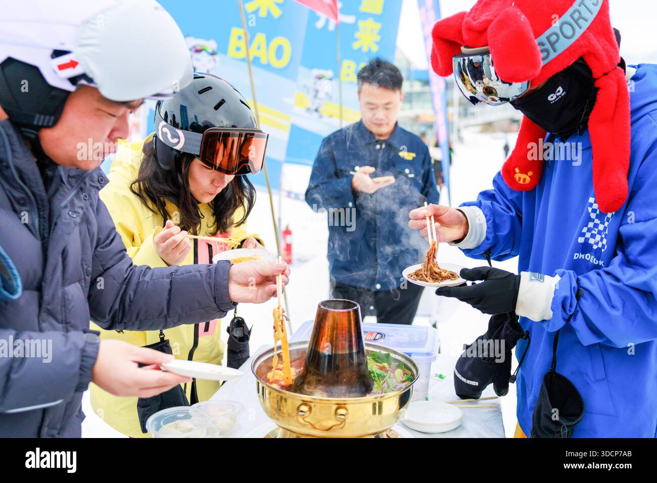Tourists enjoy skiing fun at the 23rd Urumqi Silk Road Ice & Snow ...