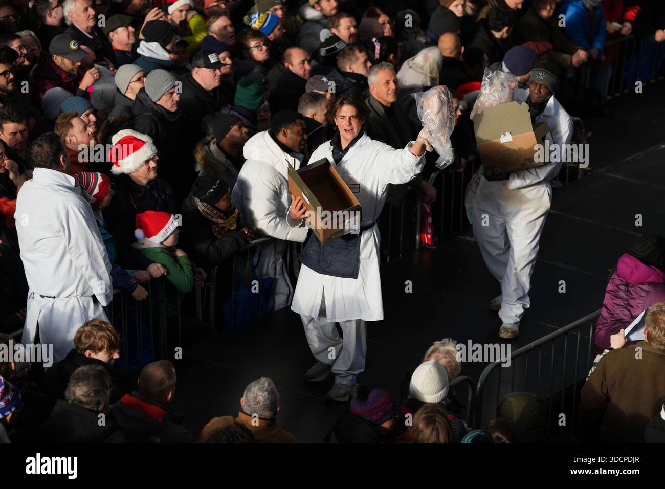 Meat is sold during the annual Christmas Eve meat auction at Smithfield ...