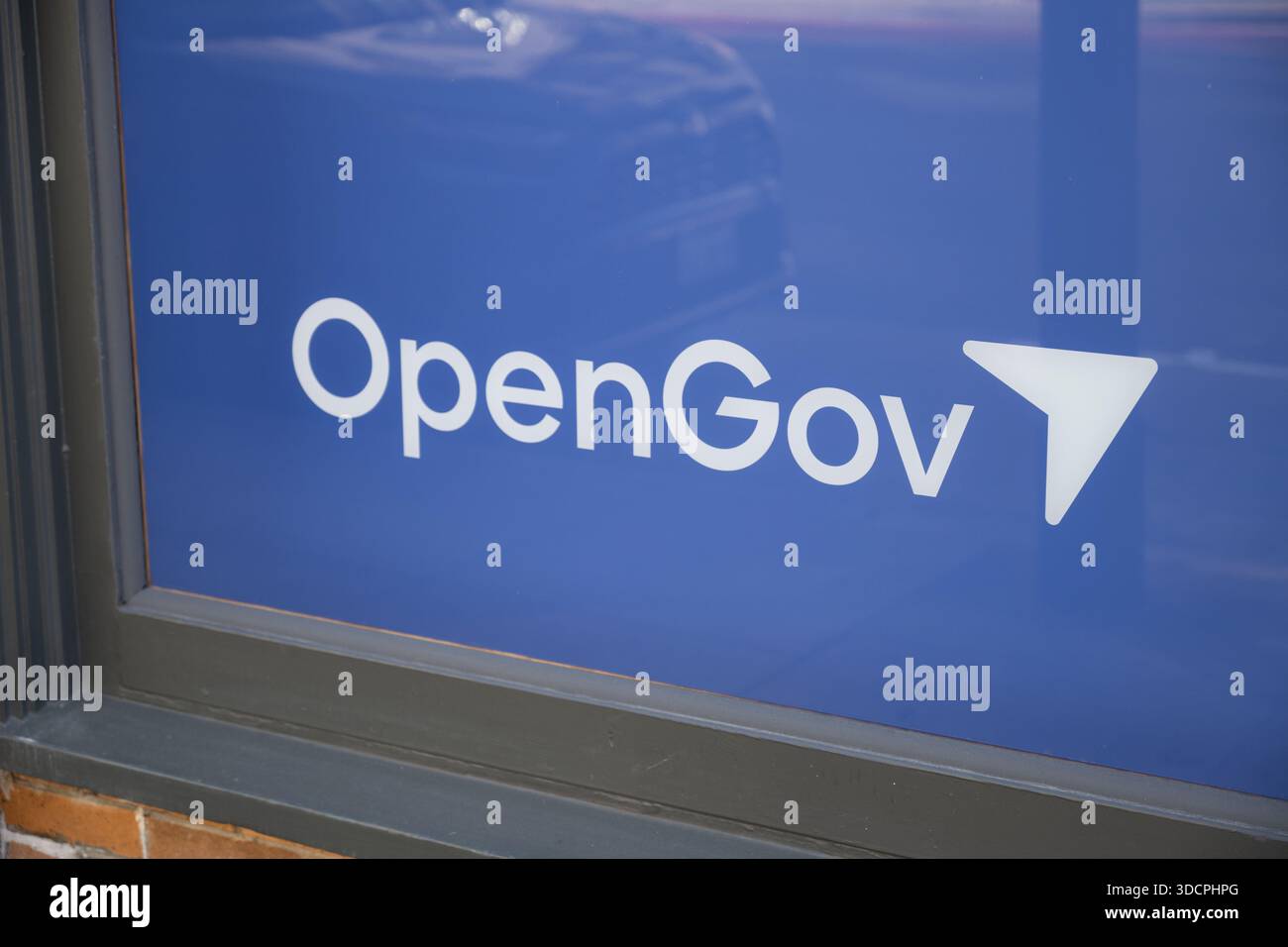 OpenGov logo on blue window signage at street level outside office ...