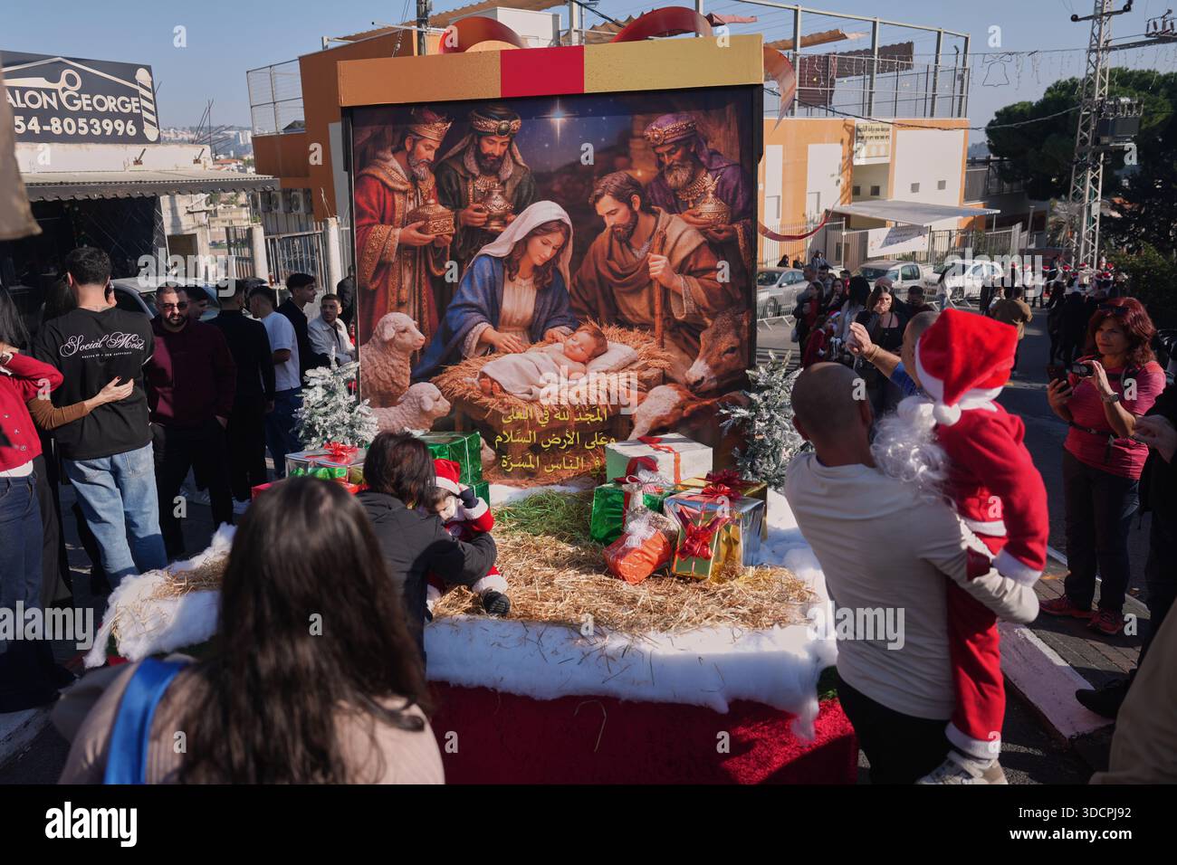 Christians celebrate the 40th annual Christmas parade heading towards ...