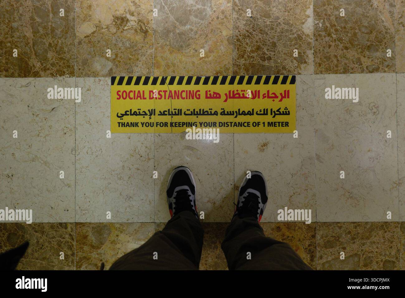 A social distancing warning sign is seen in Bethlehem, Palestine on 23 ...