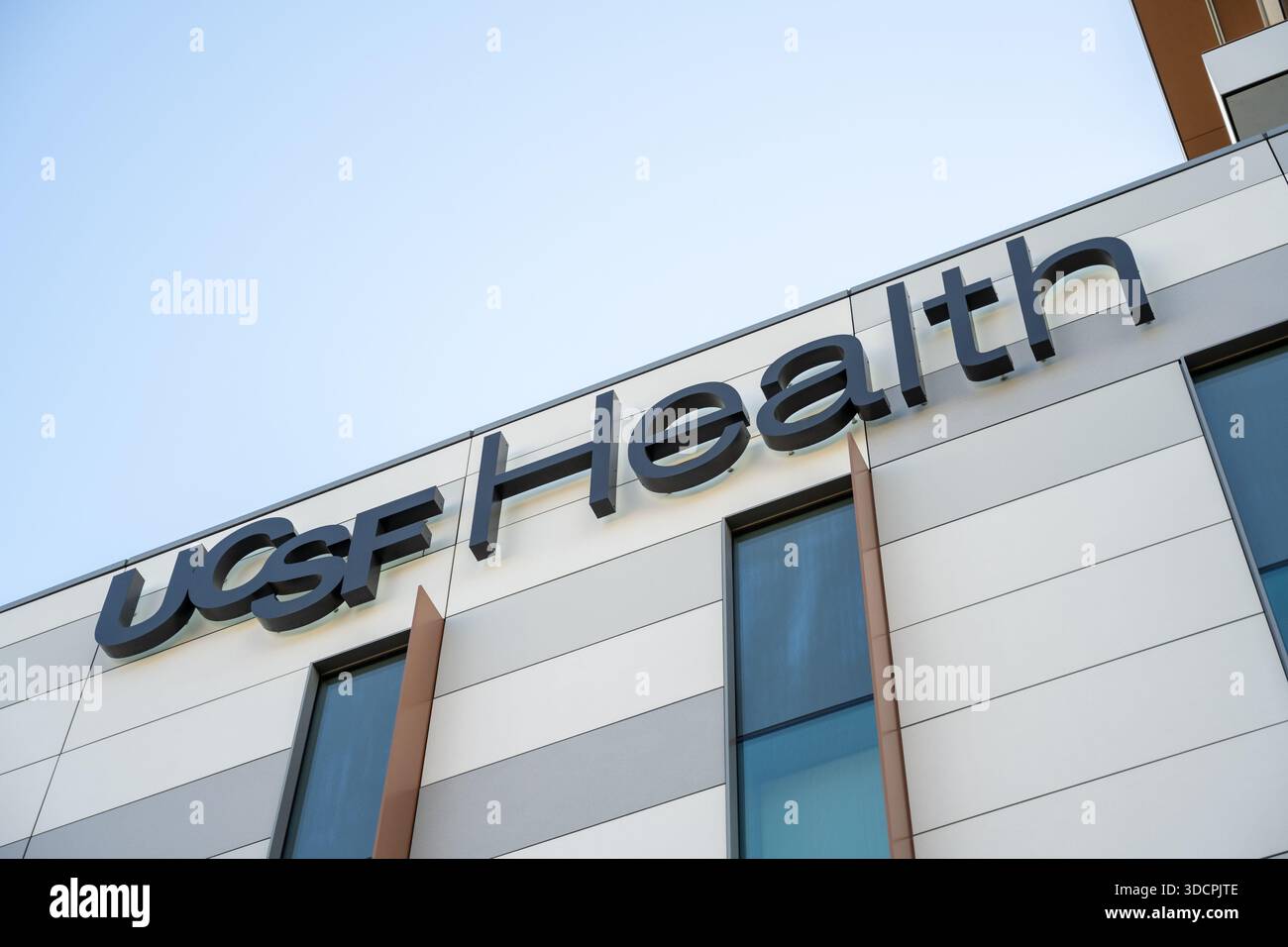 Exterior facade of UCSF Health medical building with logo and modern ...