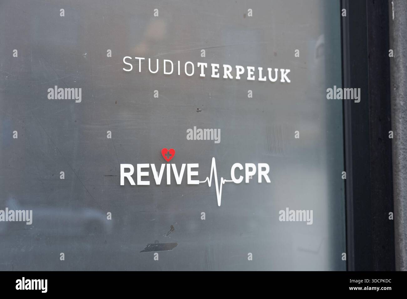 Window signage for Studio Terpeluk and Revive CPR training center on ...