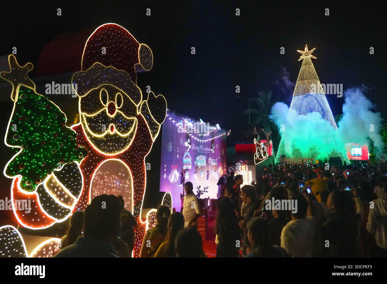 People attend a Christmas carnival in Mumbai, India, Wednesday, Dec. 24 ...