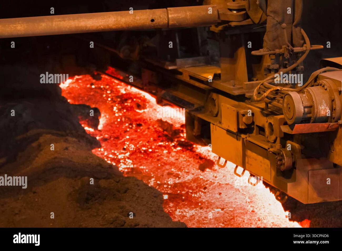 A stream of molten steel flowing from a blast furnace Stock Photo - Alamy
